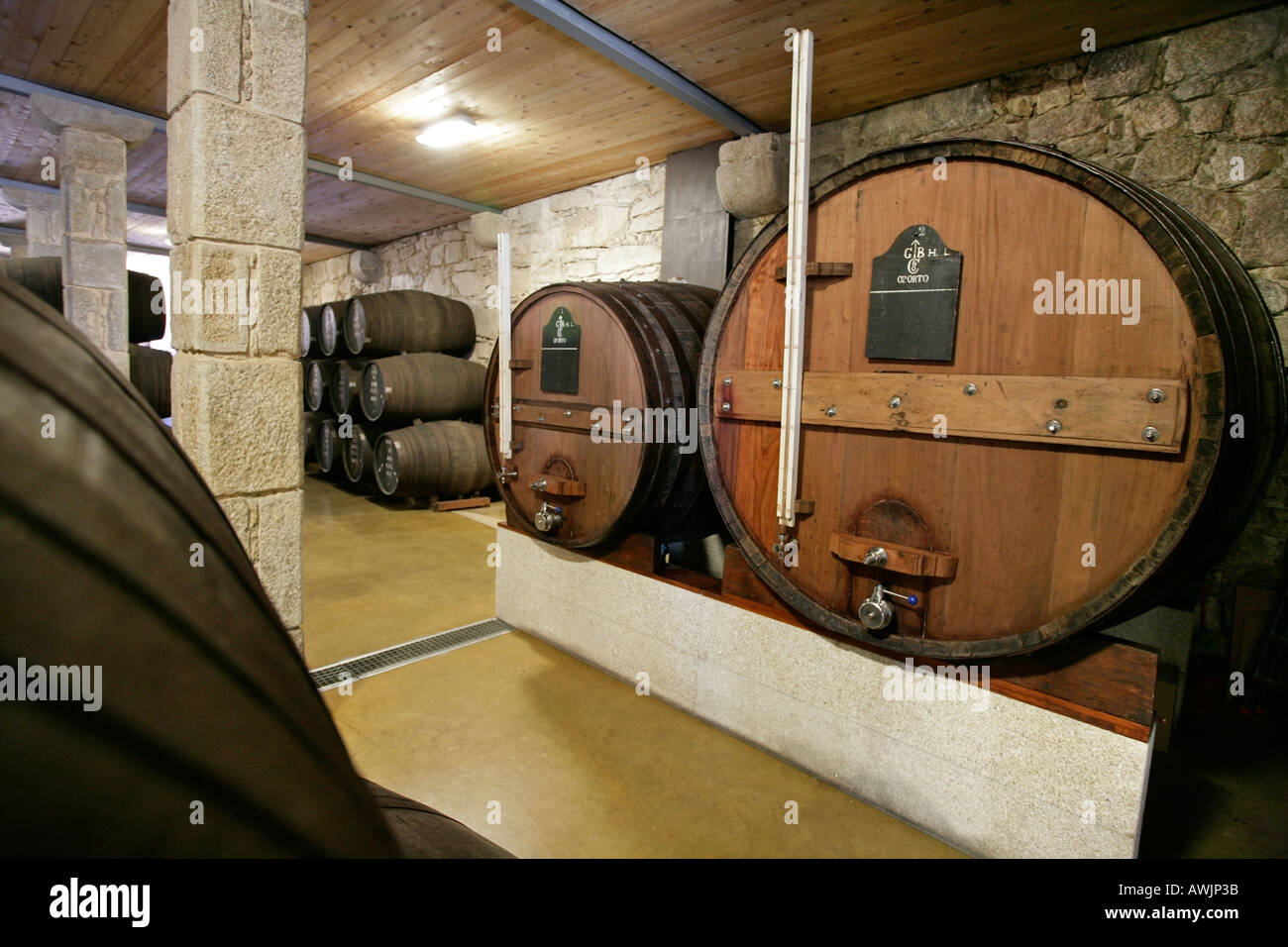Casks containing fermenting port wine in a storage room in one of the ...