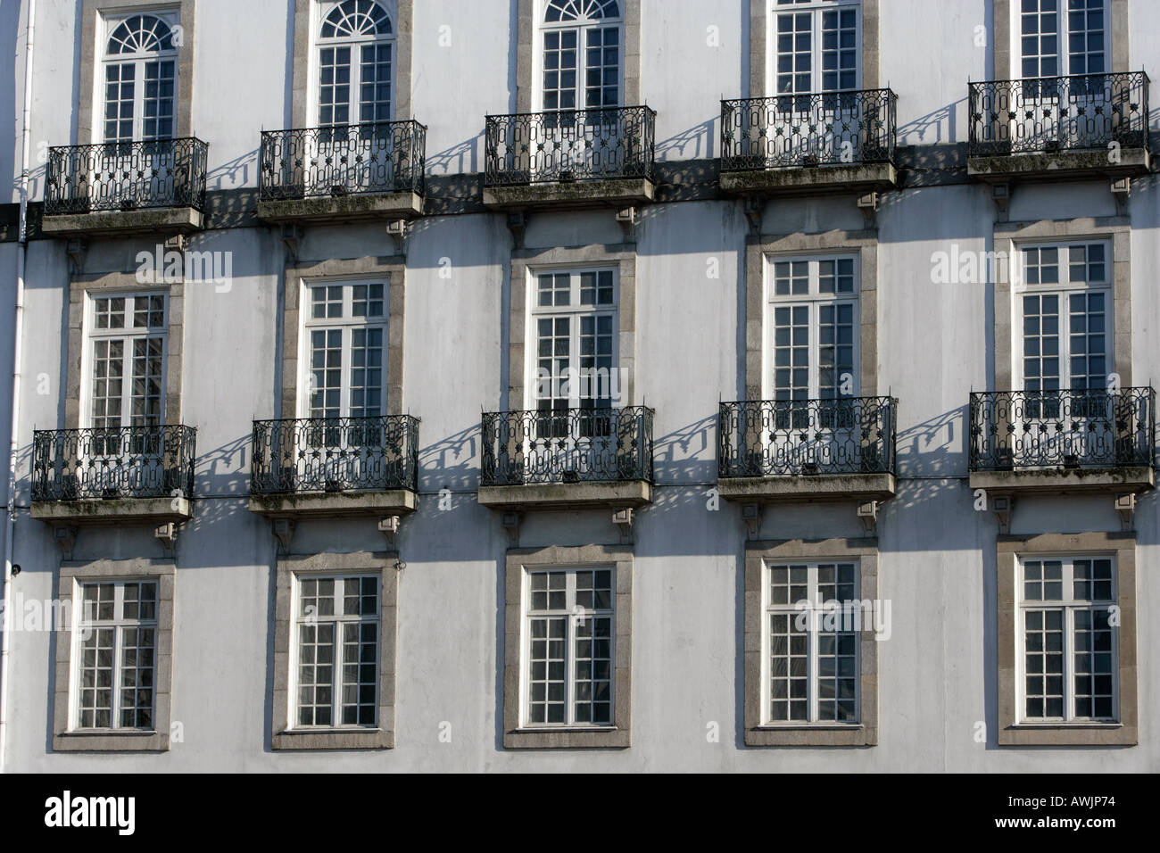 A detail shot of a classical building with multiple windows french ...