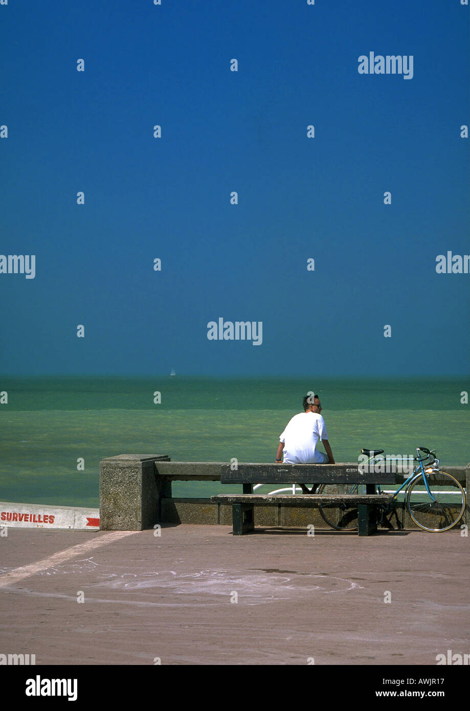 Wide rear view man sitting hi-res stock photography and images - Alamy