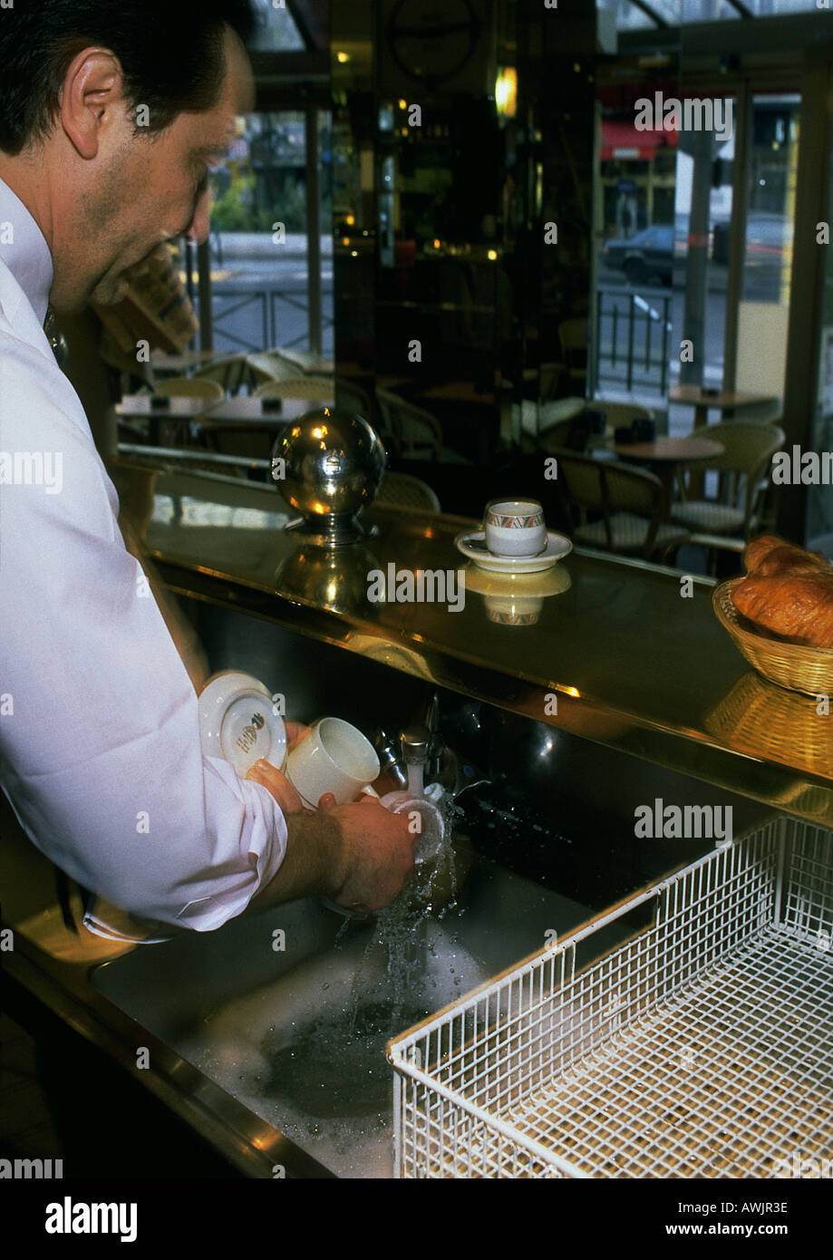 Man washing glasses in cafe Stock Photo - Alamy
