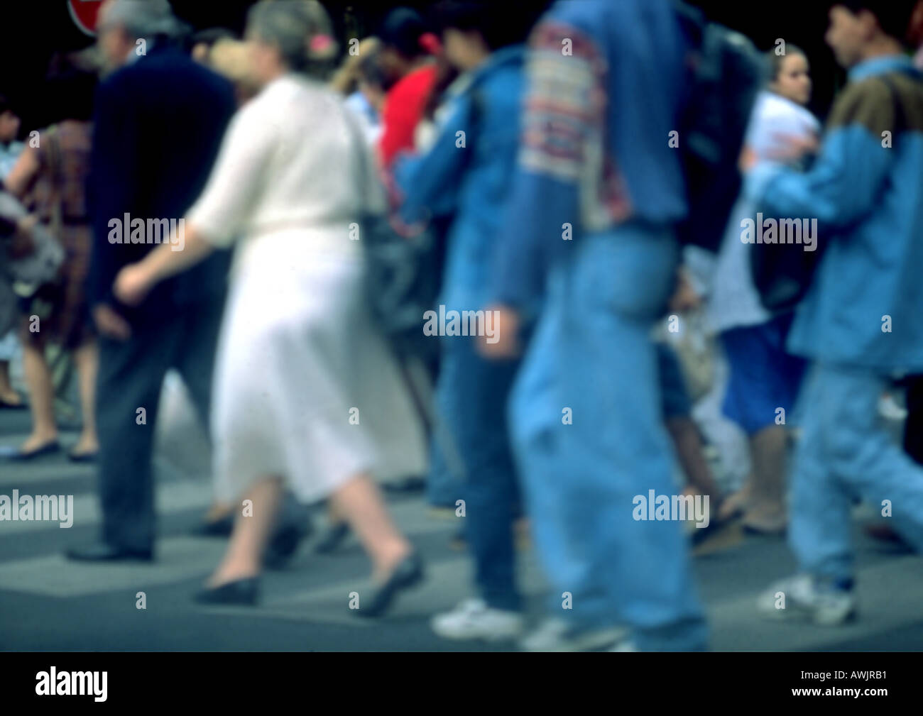 Crowd walking on crosswalk, side view, defocused Stock Photo - Alamy