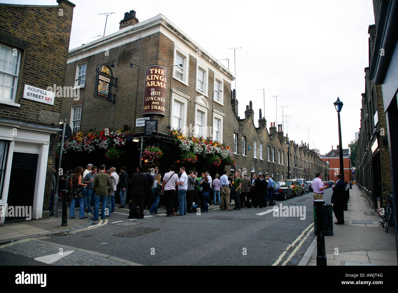 Drinking outside the Kings Arms pub on Roupell Street, Waterloo, London ...