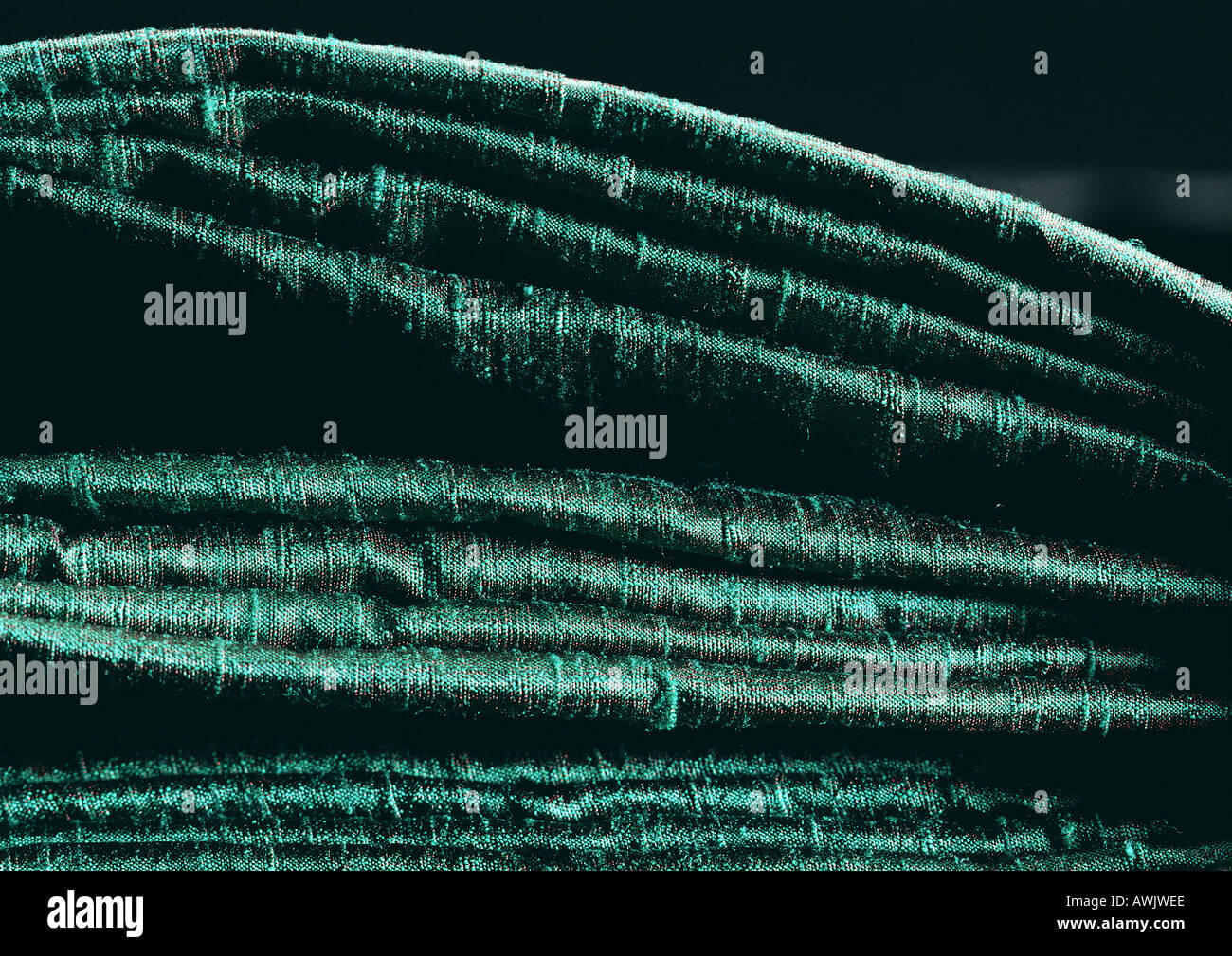 Folds in green fabric, side view, close-up, full frame Stock Photo - Alamy