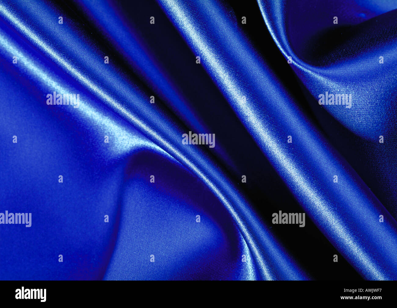 Folds in blue satin, close-up, full frame Stock Photo - Alamy