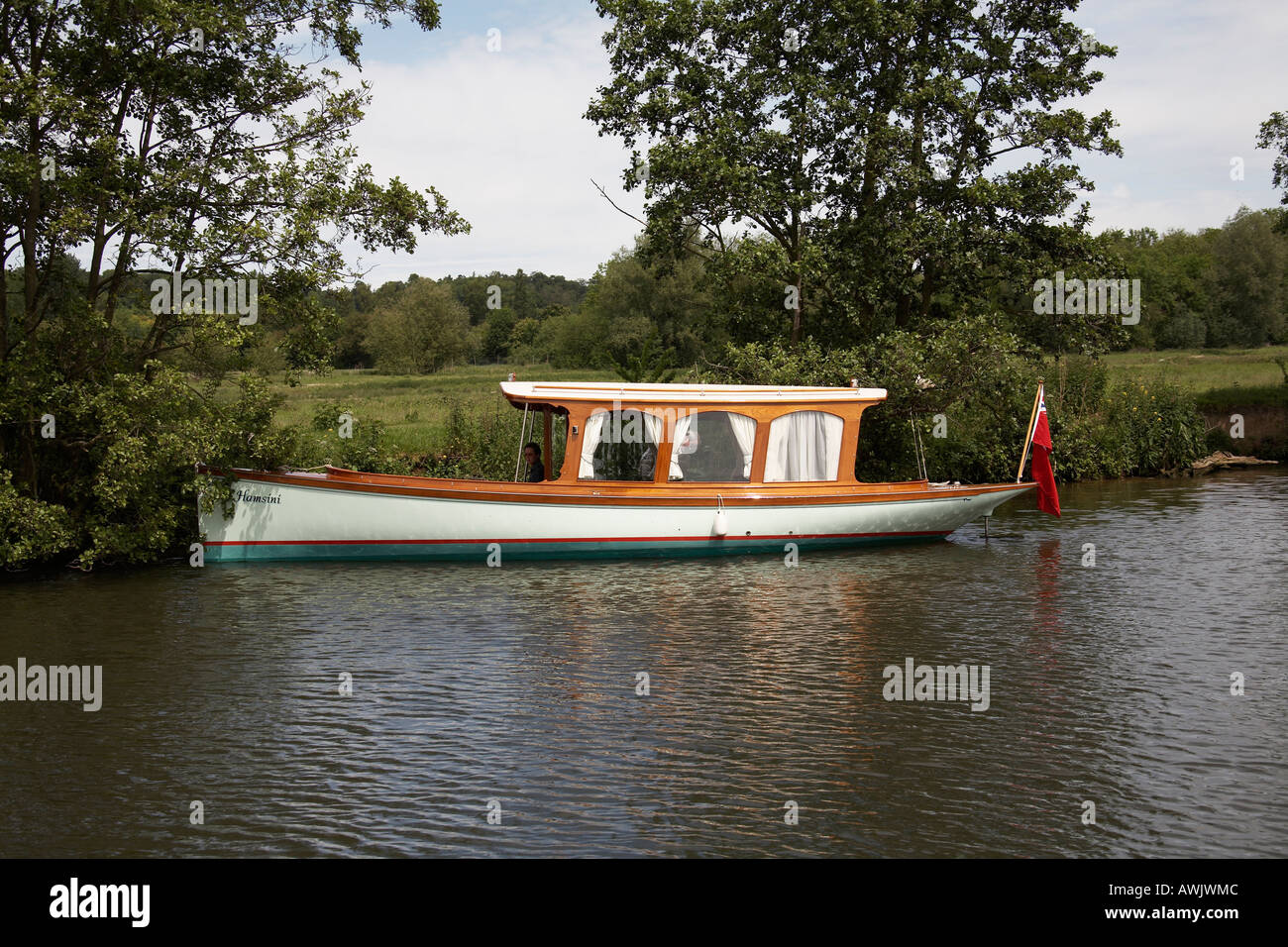 Small traditional wooden near motor yacht pleasure boat Stock Photo - Alamy