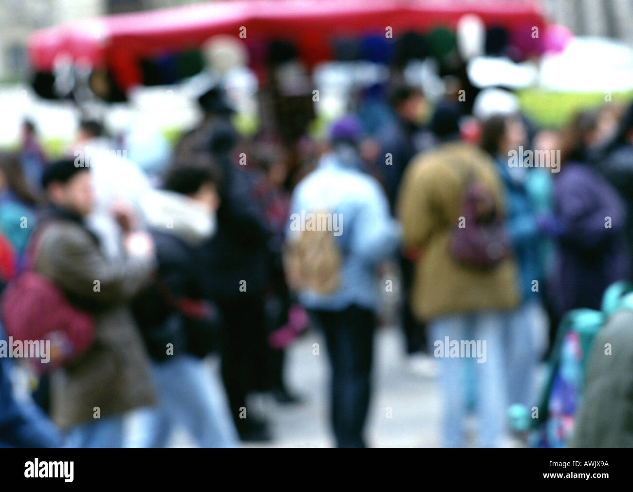 People crowded together outside, blurred Stock Photo - Alamy