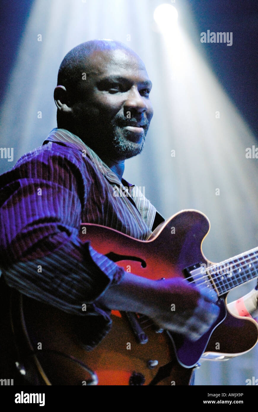Cameron Pierre on guitar with Courtney Pine at The Opera House in ...