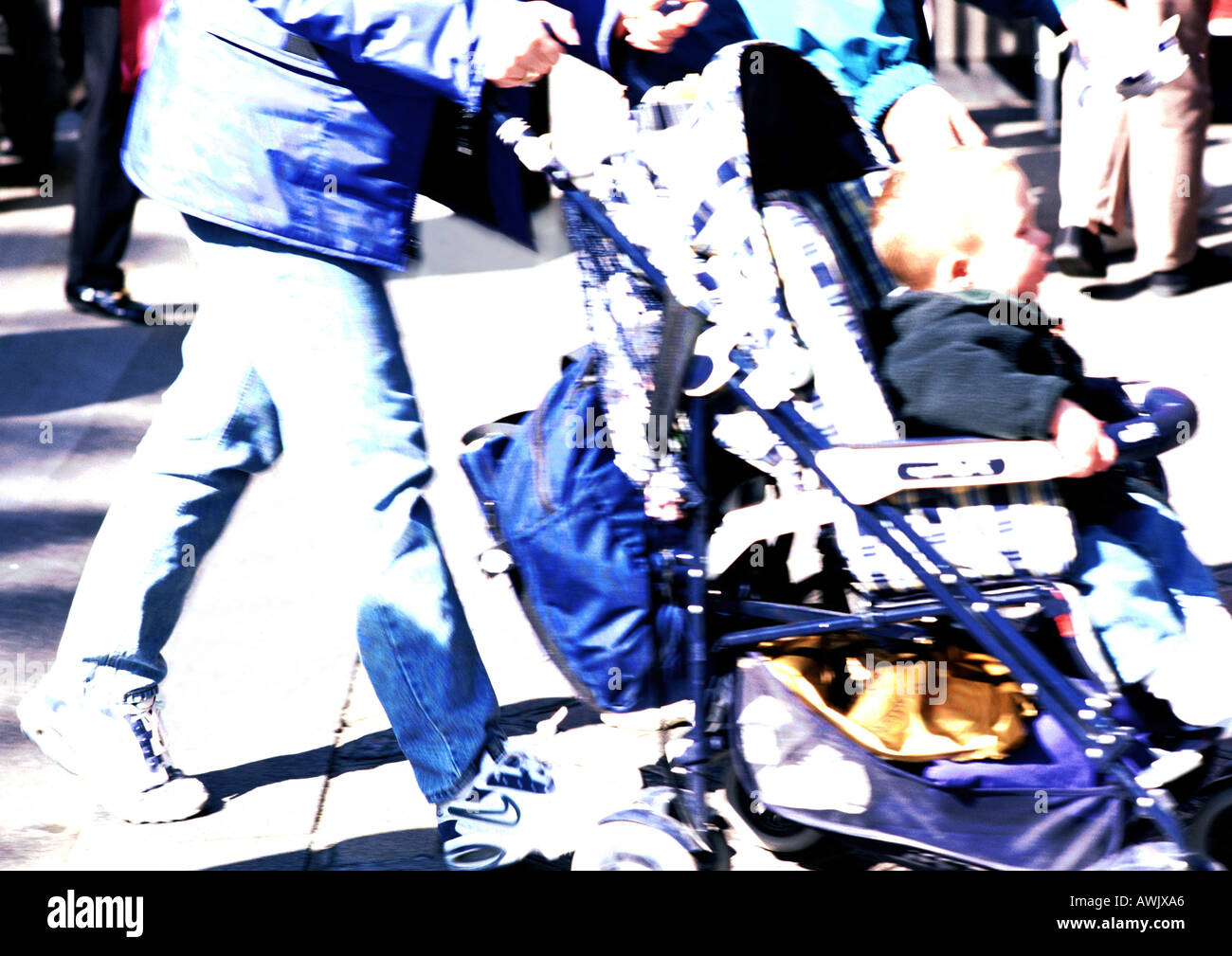 Mom pushing a stroller hi-res stock photography and images - Alamy