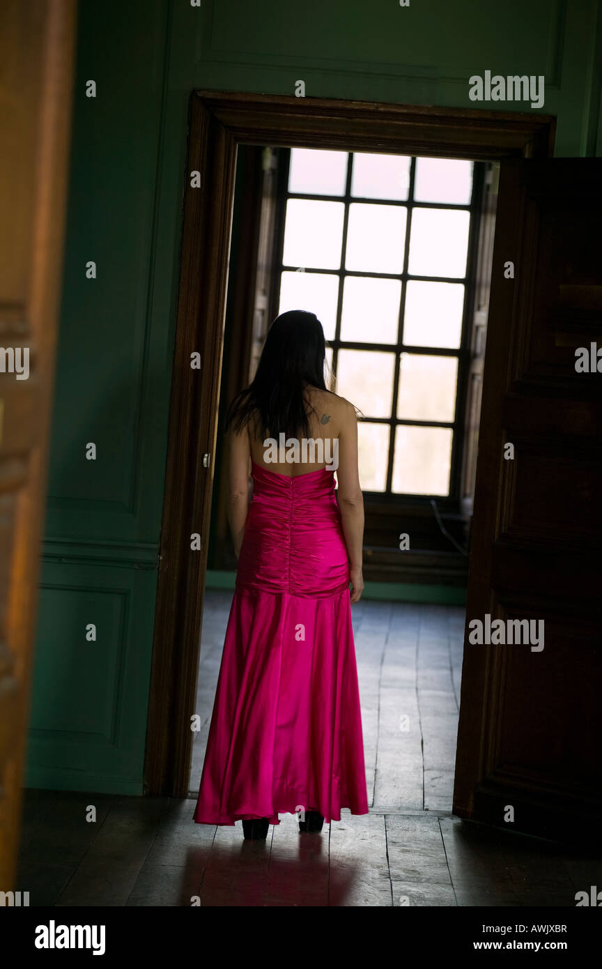 woman in inner doorway of an old building Stock Photo - Alamy