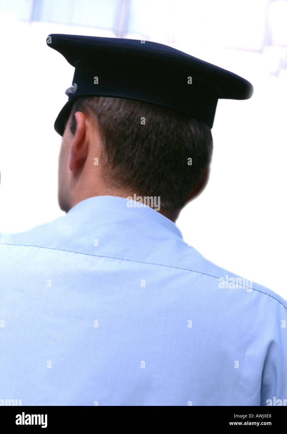 Policeman, rear view Stock Photo - Alamy