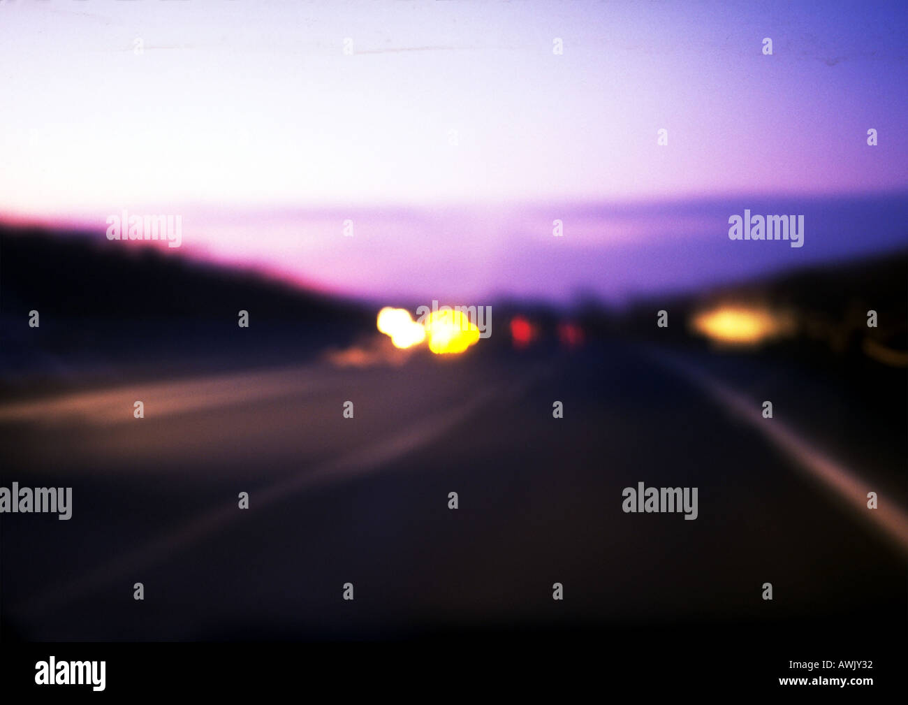 Road at night with cars, blurry Stock Photo - Alamy