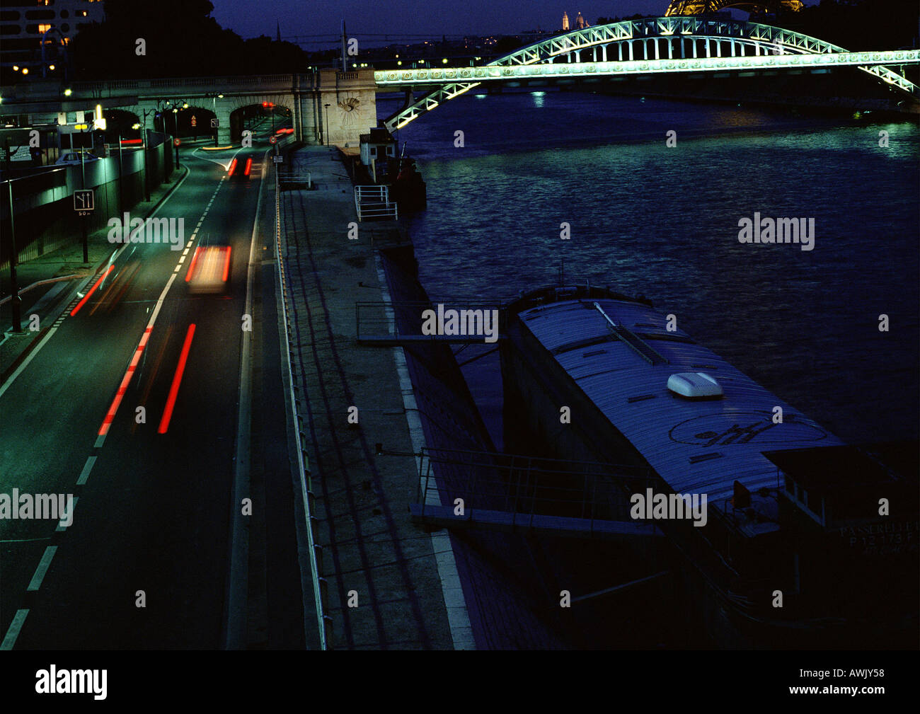 France, Paris, cars traveling on quai at night, blurry Stock Photo - Alamy