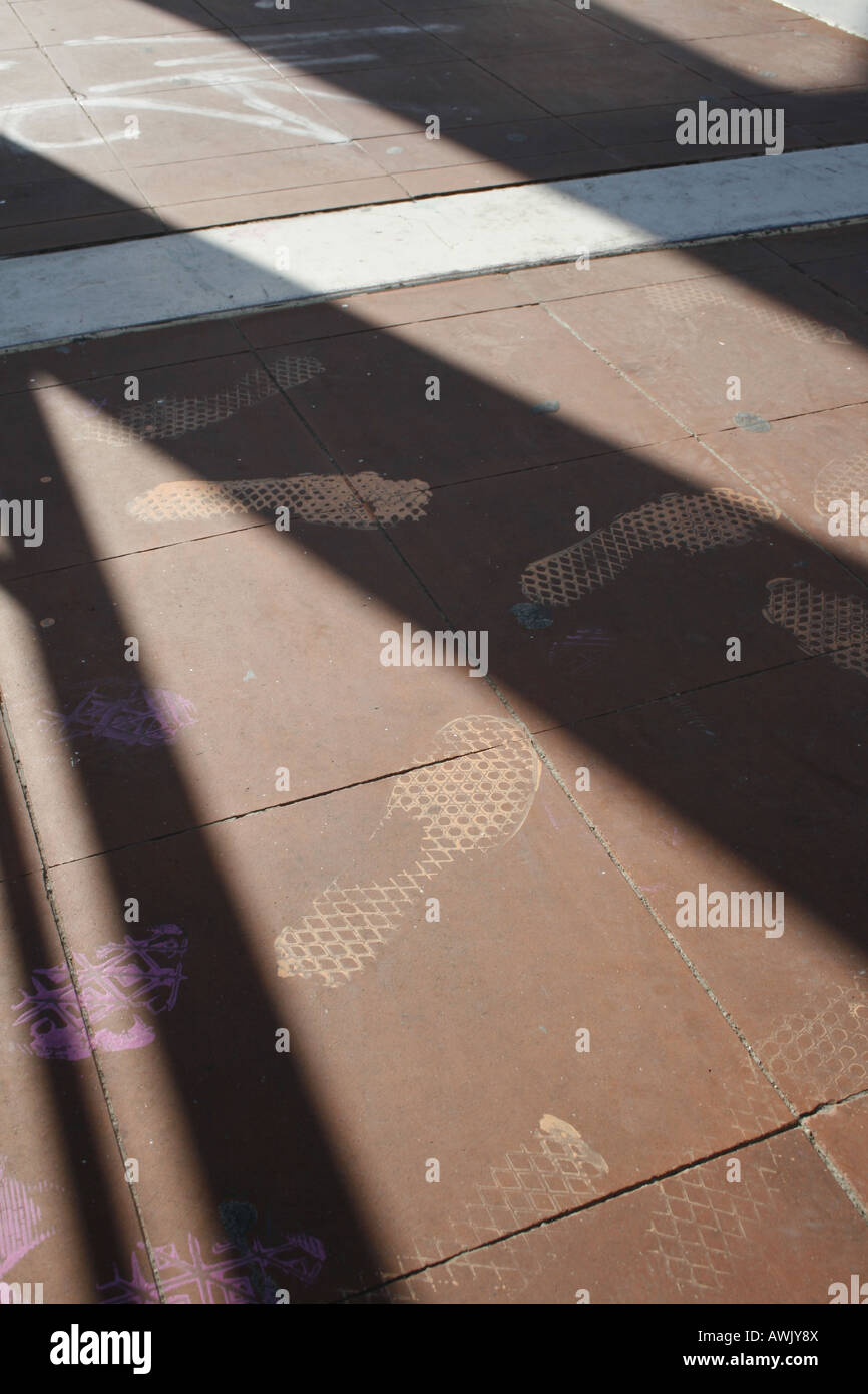paint footsteps on ground Stock Photo - Alamy