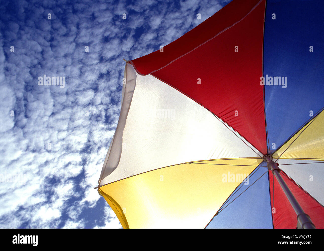 Beach parasol and sky, low angle view Stock Photo - Alamy