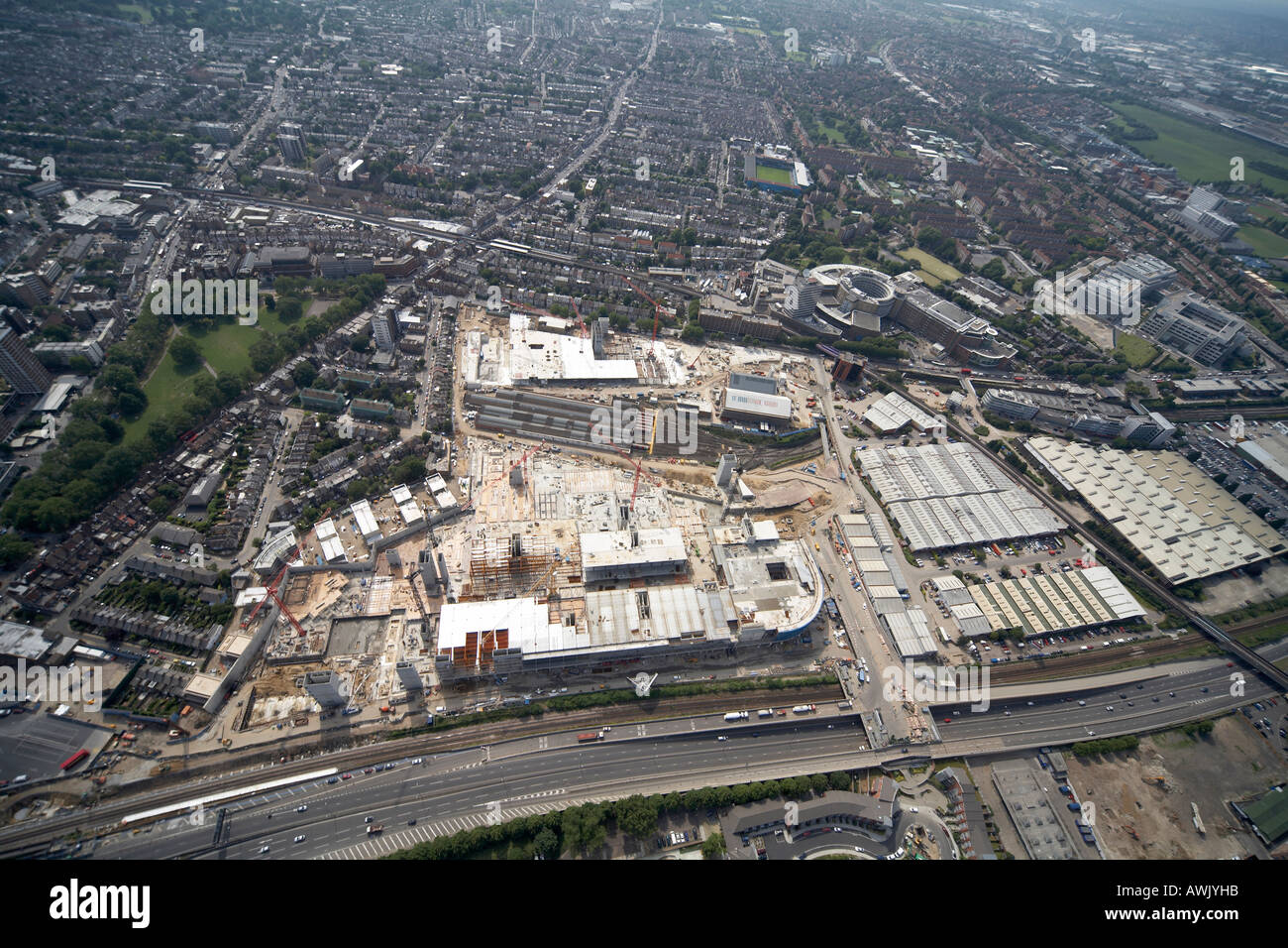 High level oblique aerial view west of Multiplex White City Building ...