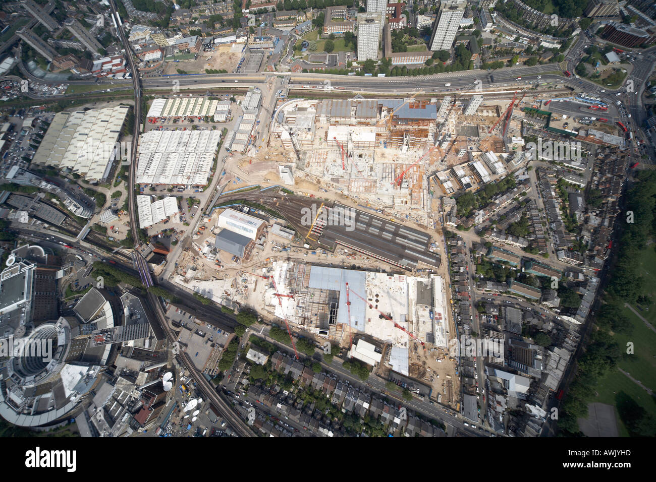 High level oblique aerial view west of Multiplex White City Building ...