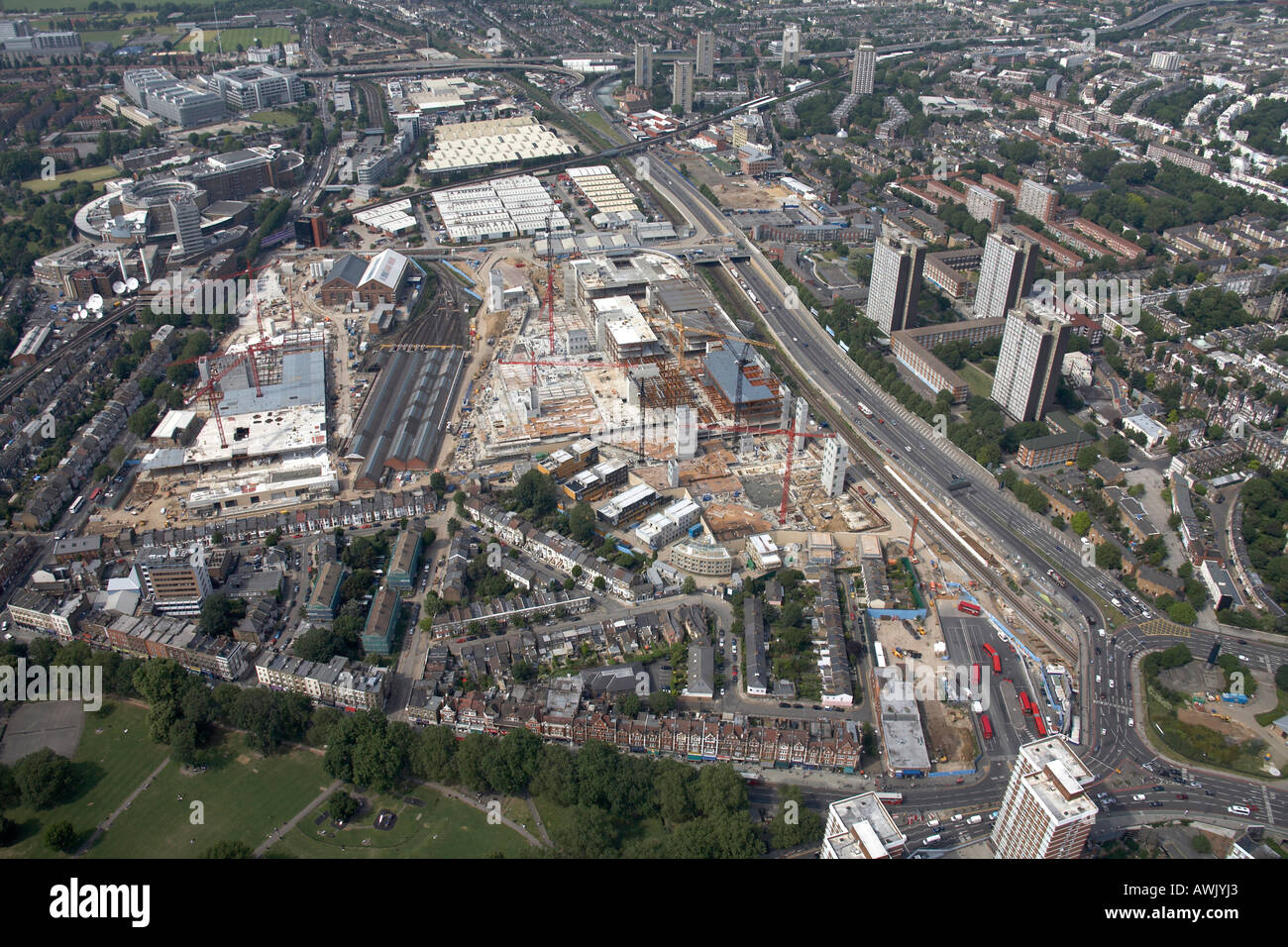 High level oblique aerial view west of Multiplex White City Building ...