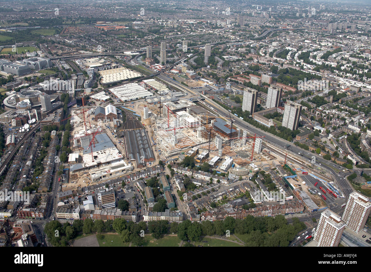 High level oblique aerial view west of Multiplex White City Building ...