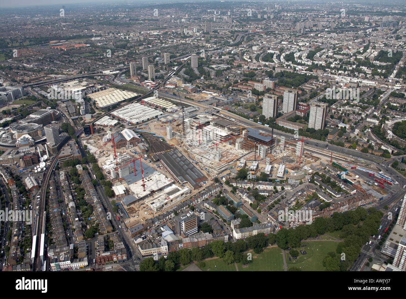 High level oblique aerial view west of Multiplex White City Building ...