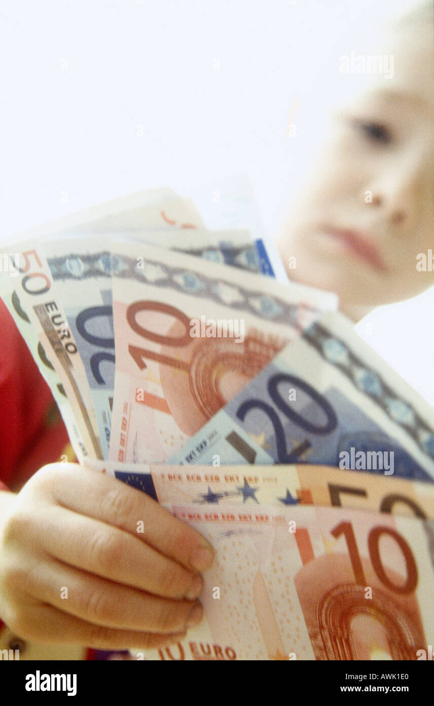 Boy Receiving Money High Resolution Stock Photography and Images - Alamy