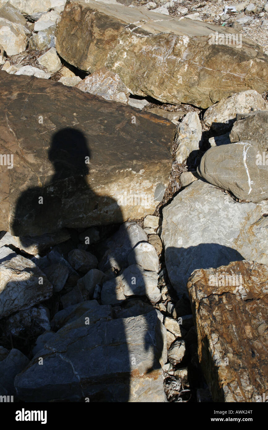 shadow of person on rocks in mountains Stock Photo - Alamy