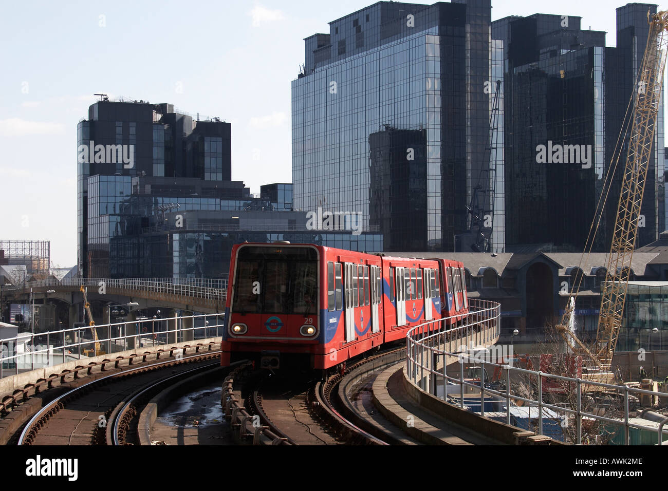 DLR Docklands Light Railway train approaching South Quay station with ...