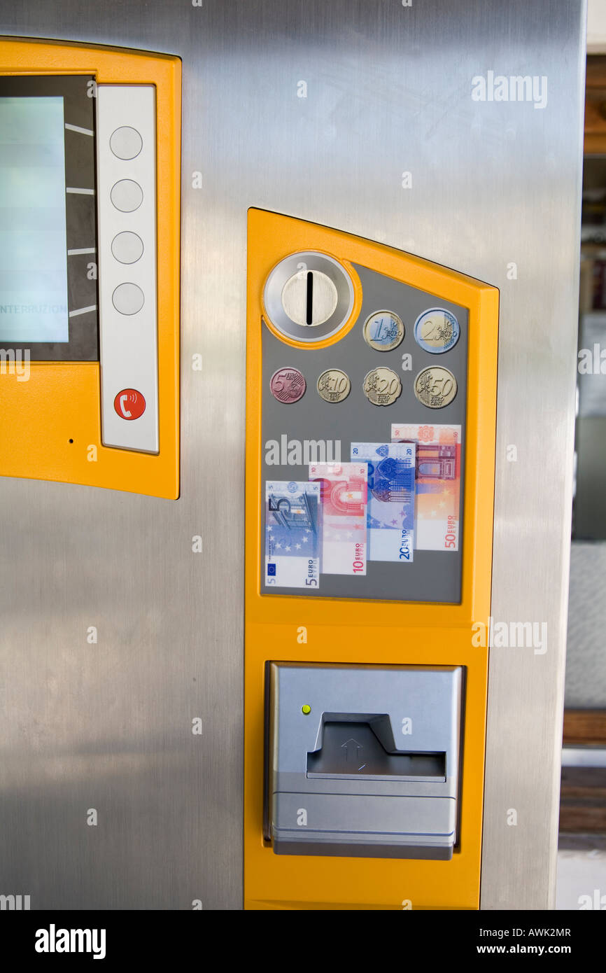 moneychanger on the wall Stock Photo - Alamy