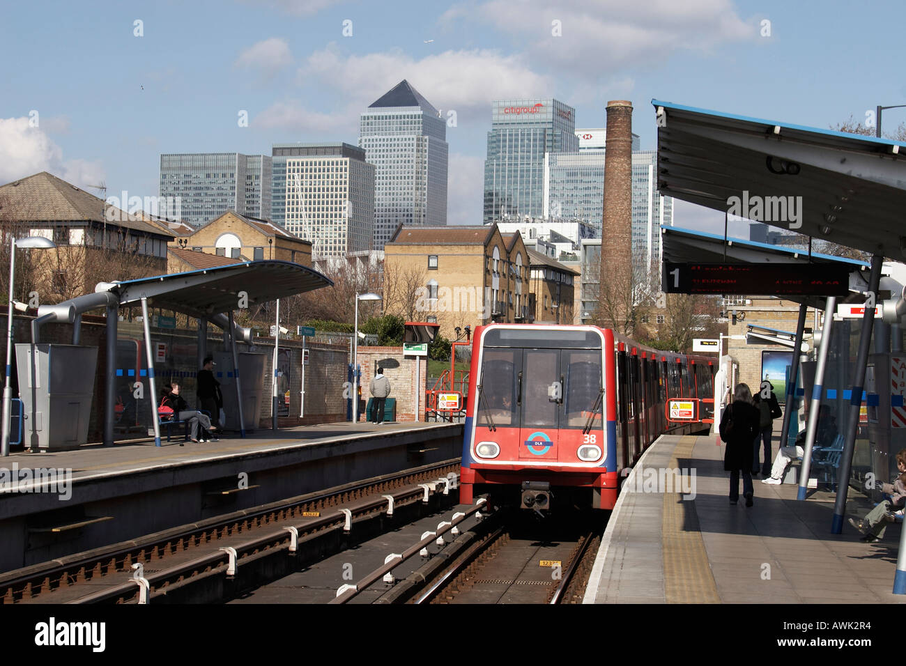 DLR Docklands Light Railway train at Crossharbour Station with tall ...