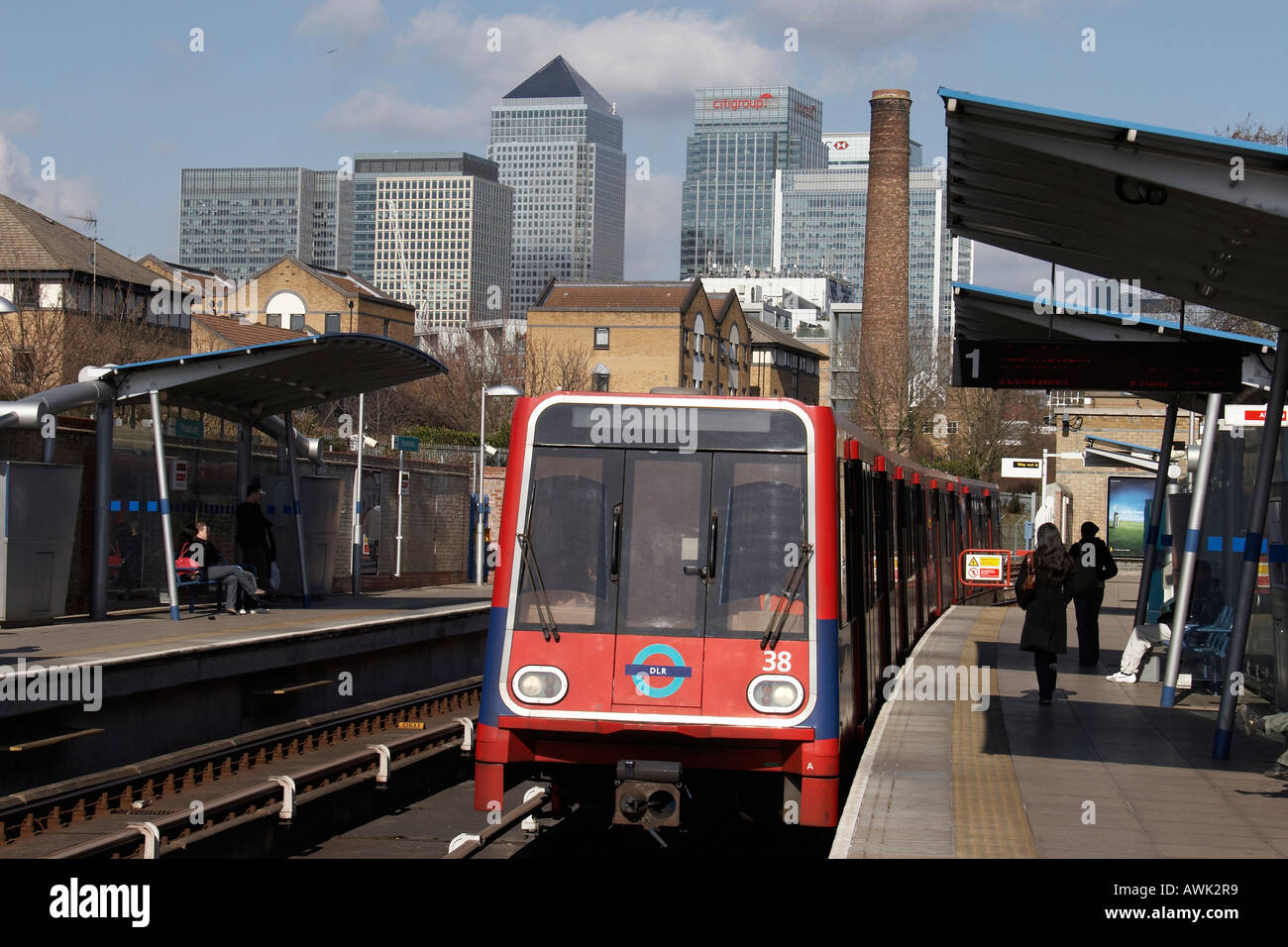DLR Docklands Light Railway train at Crossharbour Station with tall ...