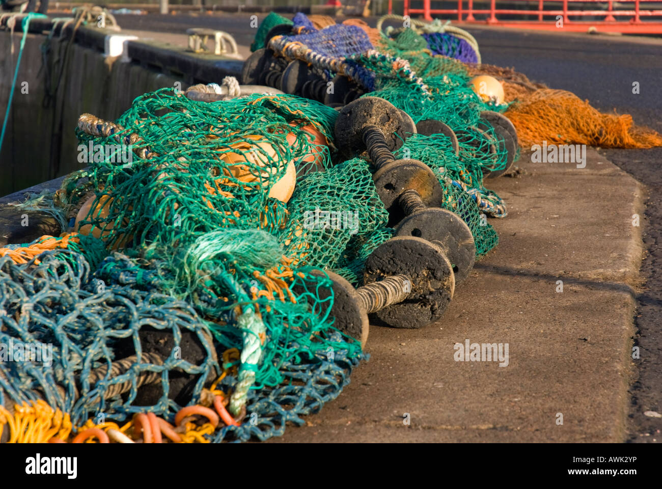 Fishing nets on the harbour wall at Eyemouth Stock Photo - Alamy