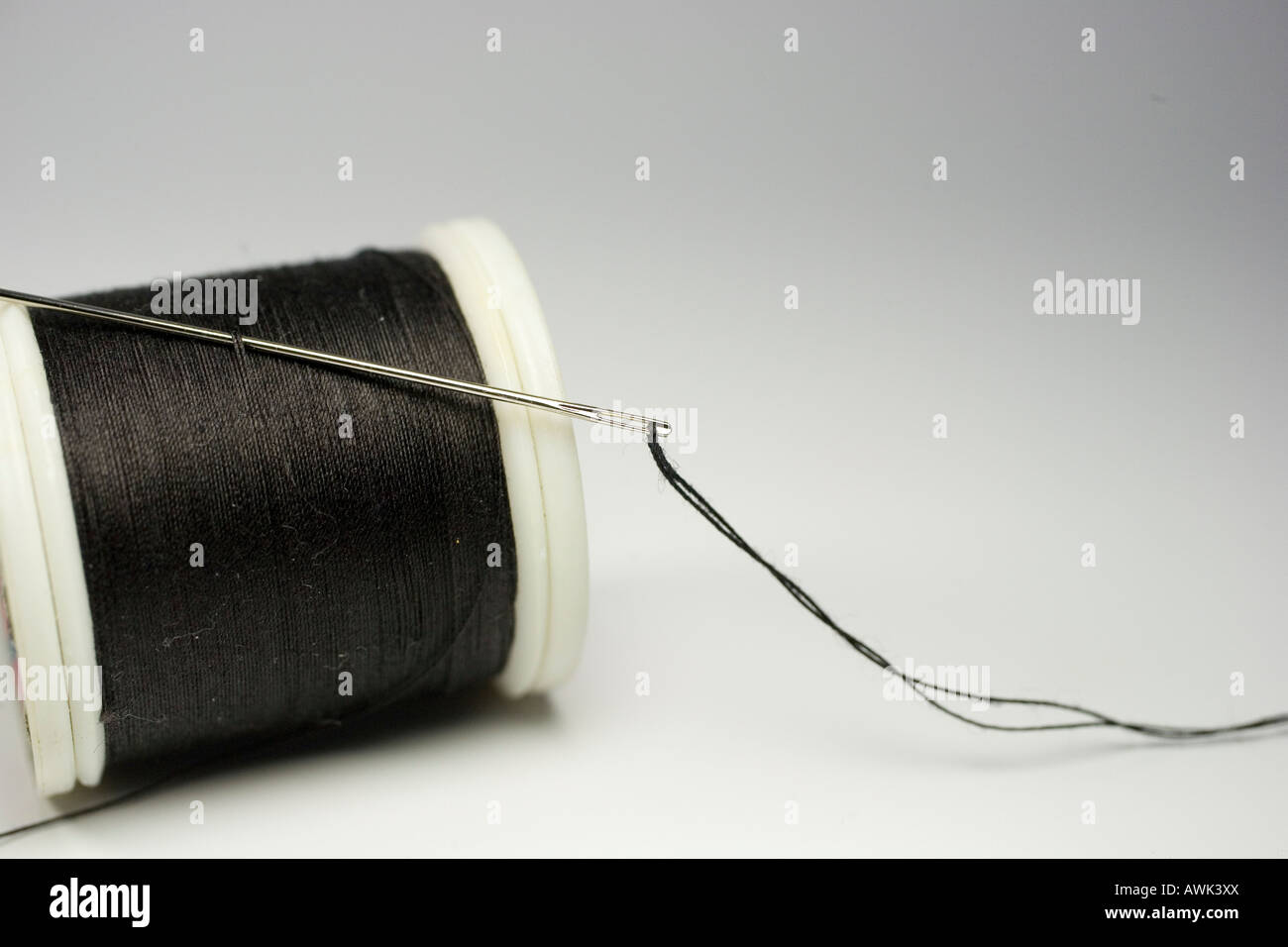 needle and thread Stock Photo - Alamy