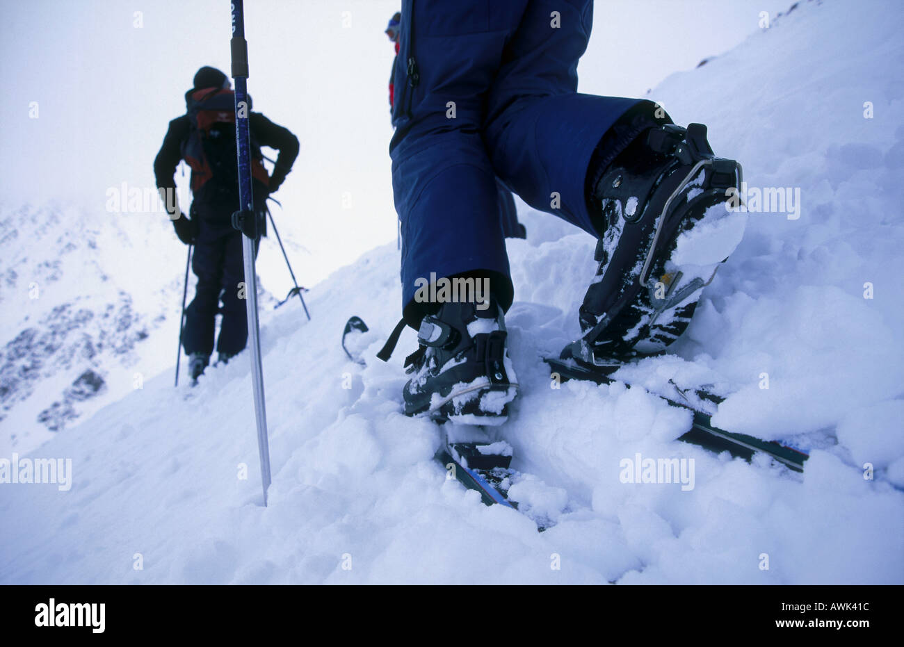 two people walking in snow Stock Photo - Alamy