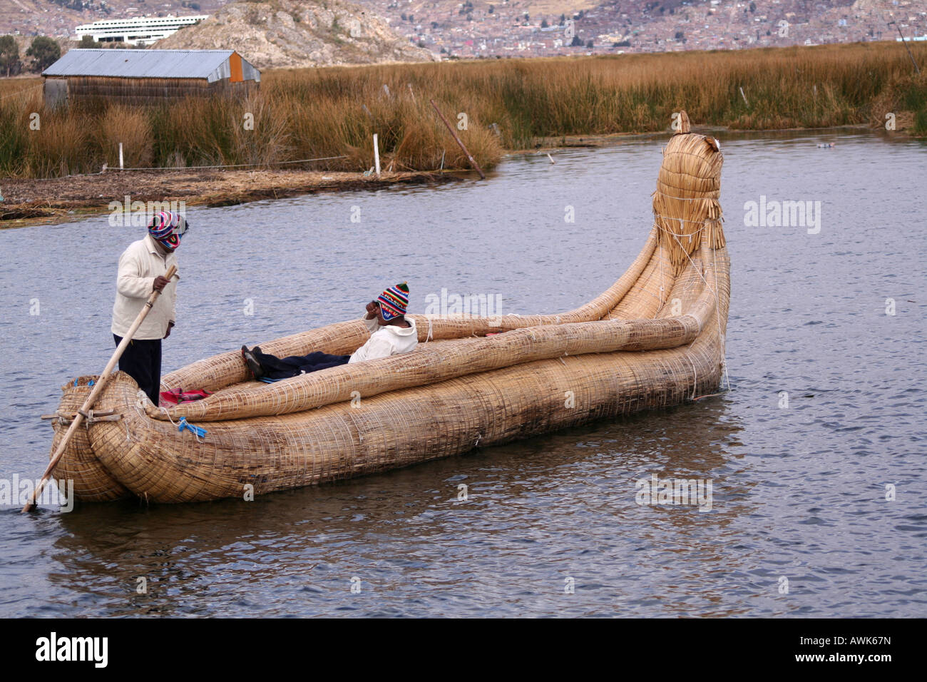 Uros boatmen Uros reed islands Lake Titicaca Peru Stock Photo - Alamy