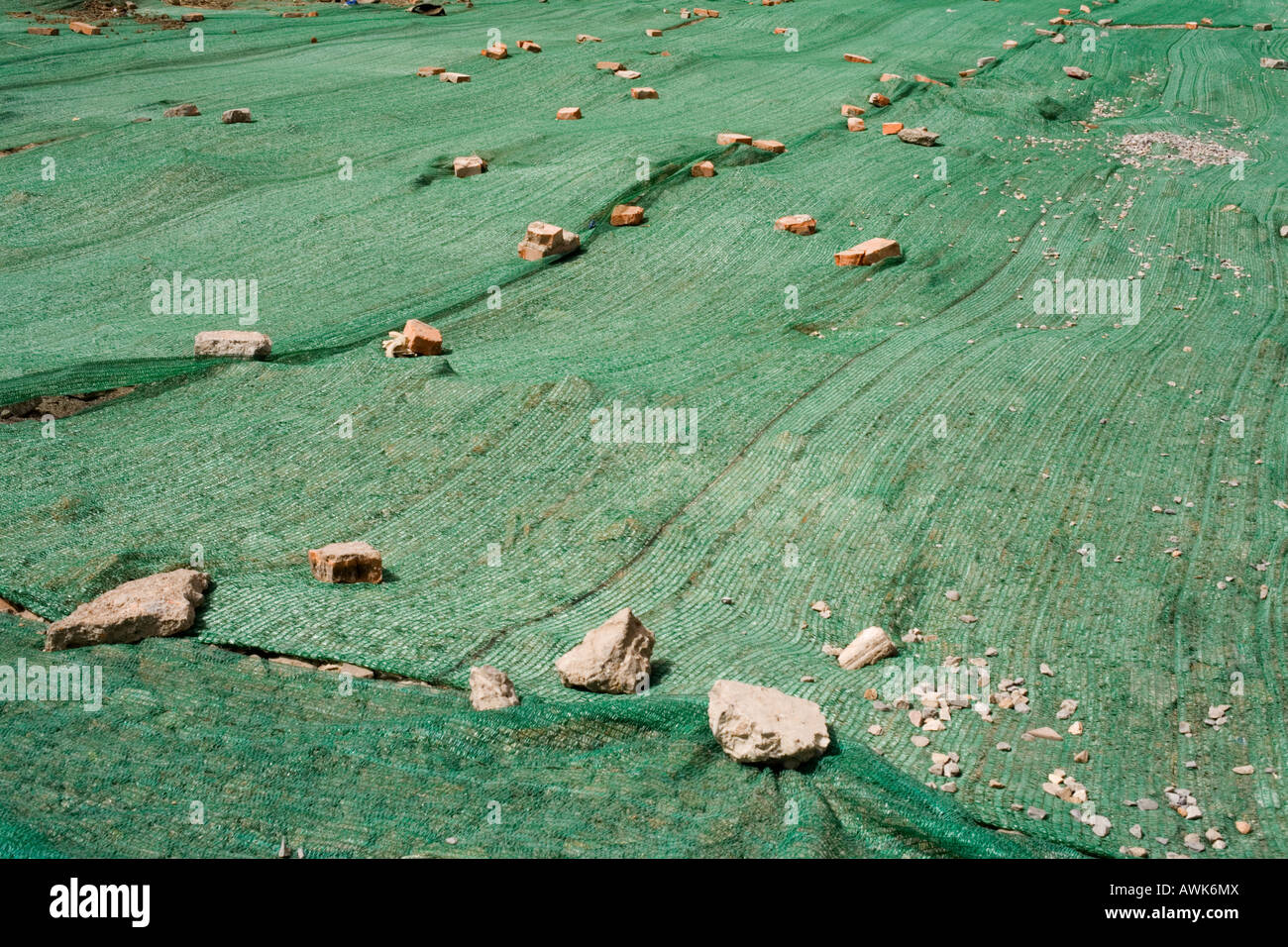 A building site covered in green netting, Beijing, The People's ...