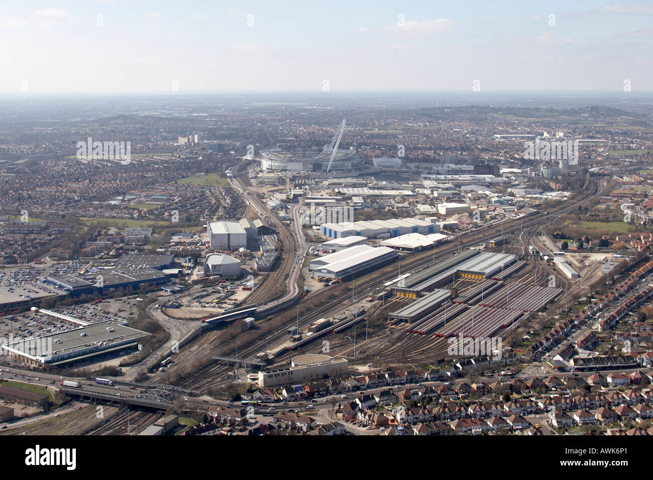 High level oblique aerial view north west of Neasden with Wembley ...