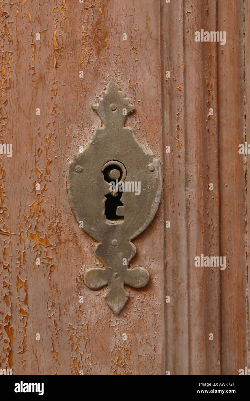 Brown wooden door. Key hole design, Keyhole Wood and nails Stock Photo ...