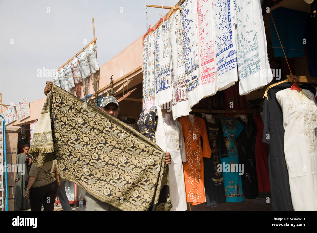Man selling carpet at Edfu Egypt Stock Photo - Alamy