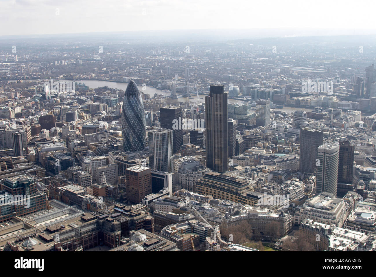 High level oblique aerial view south east of Gherkin Tower 42 Tower of ...