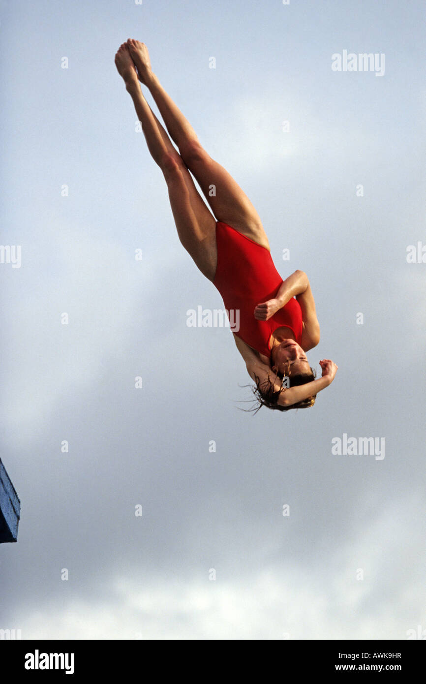 Women diver flying through the air Stock Photo - Alamy