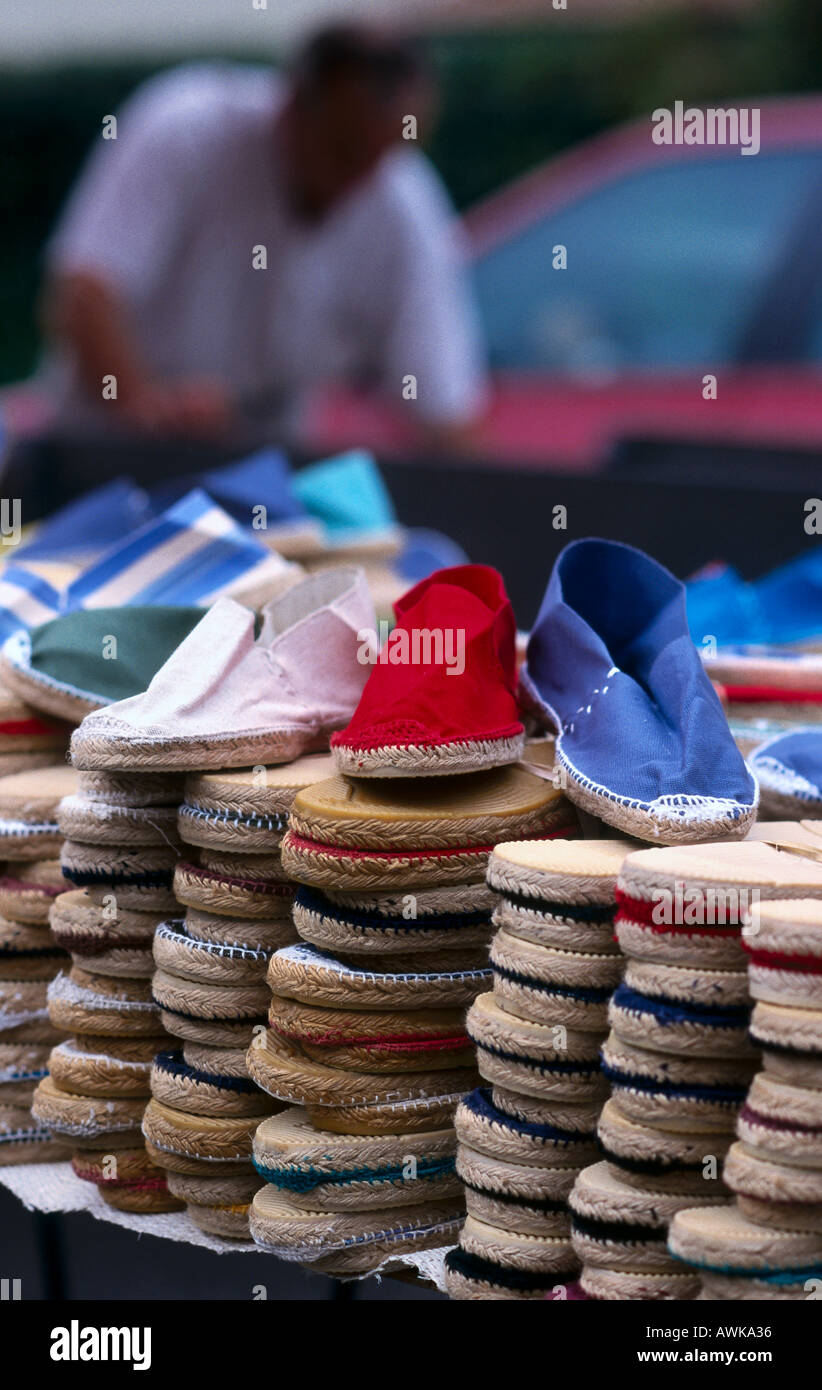Stack of shoes at market stall hi-res stock photography and images - Alamy