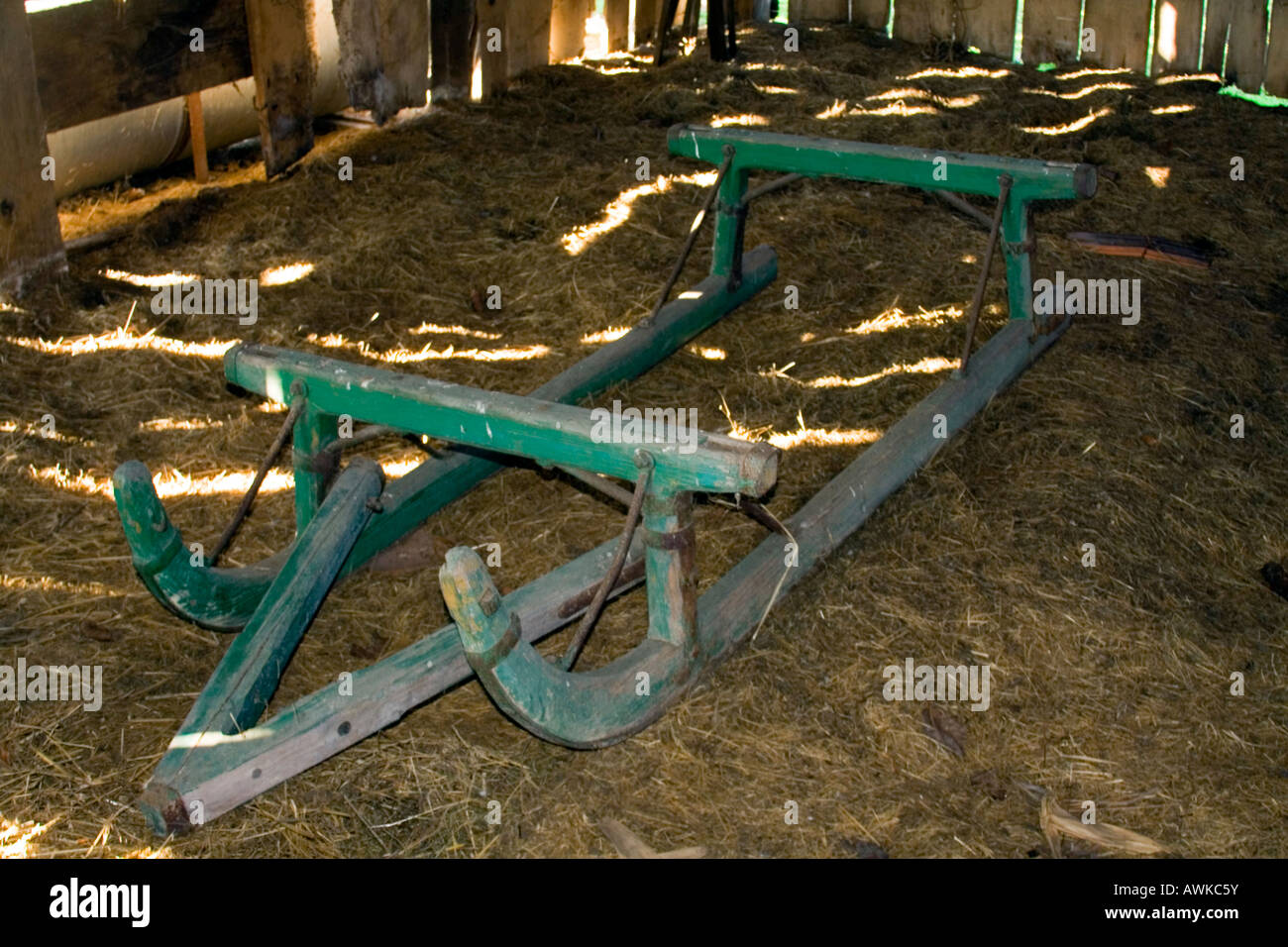 Old rustic farm sled under the barn Stock Photo - Alamy