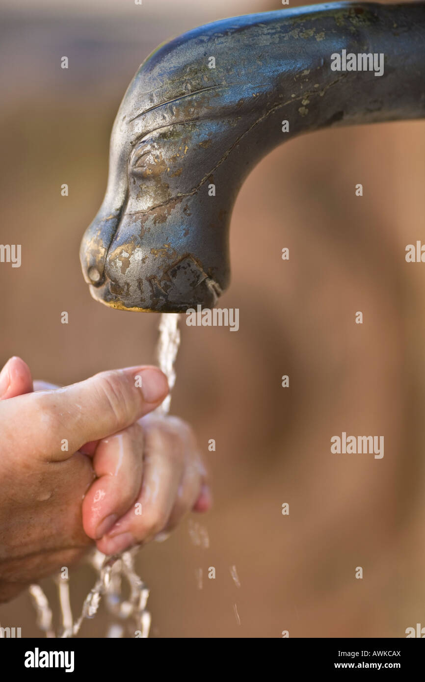 washing hands under the tap Stock Photo - Alamy