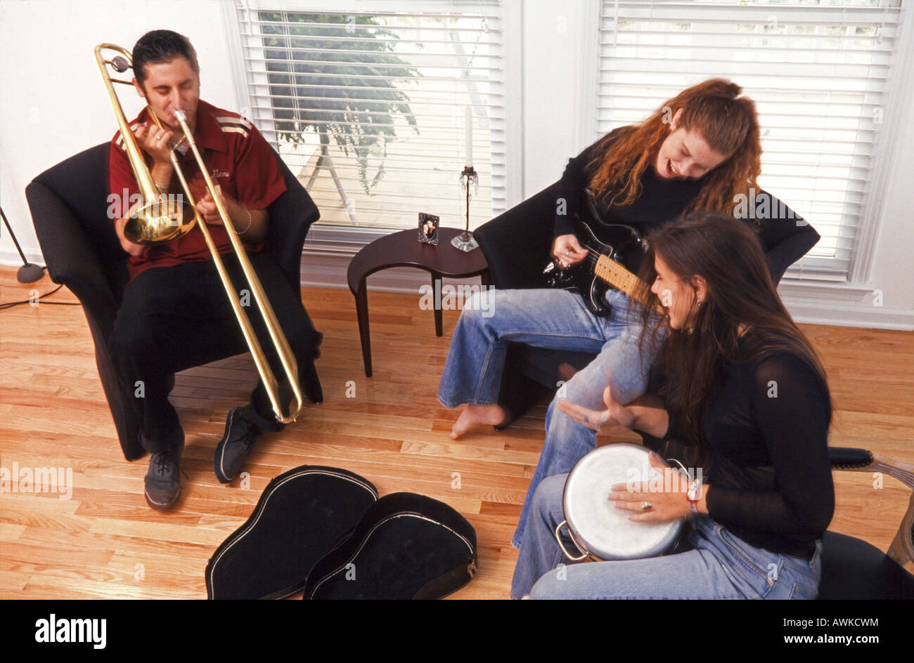 Couples playing together, musical instruments Stock Photo - Alamy