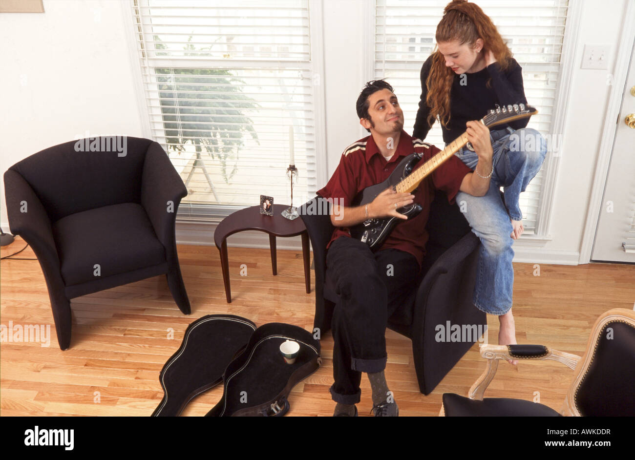 Couples playing together, musical instruments Stock Photo - Alamy