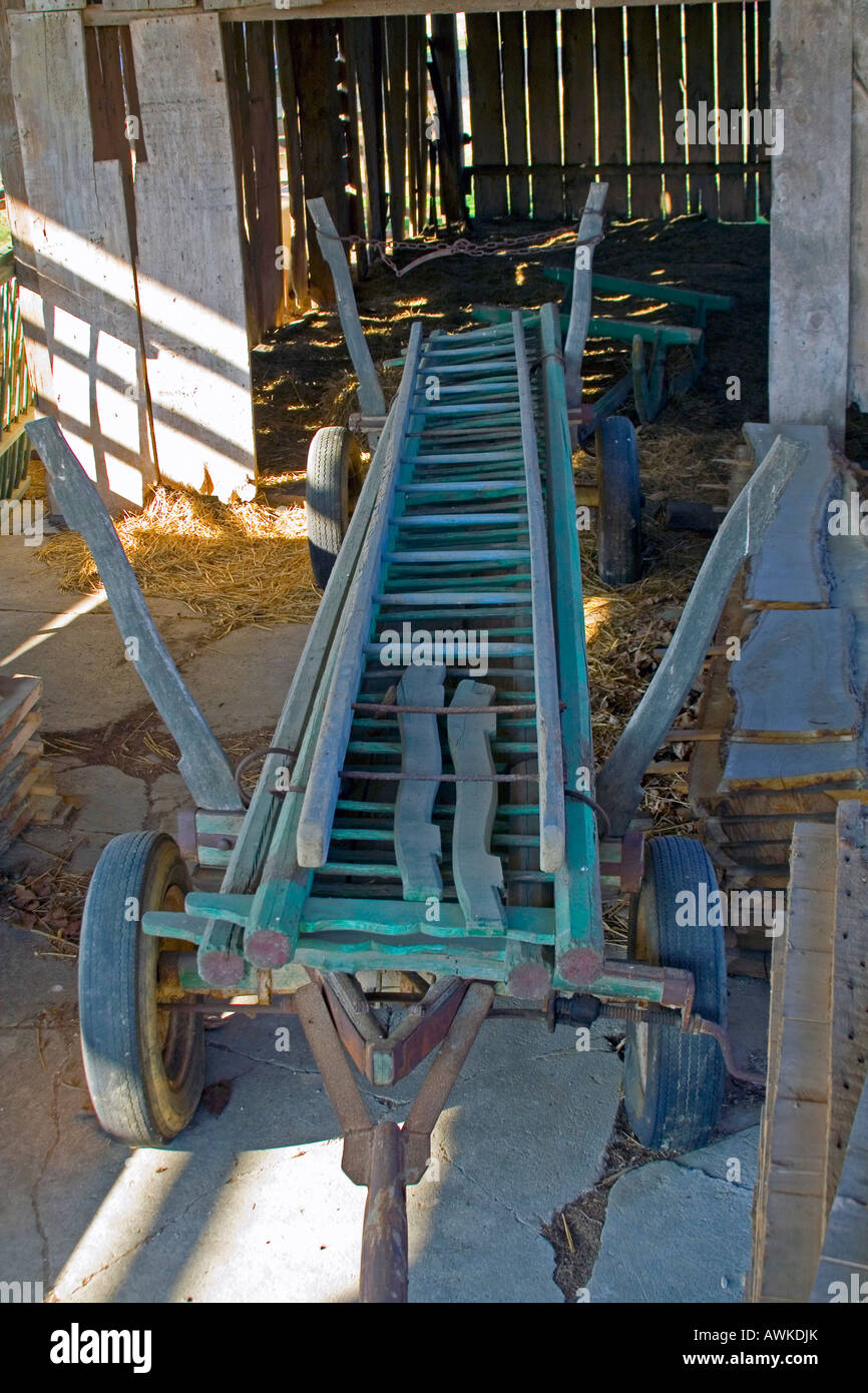 Old rustic farm cart under the barn Stock Photo - Alamy