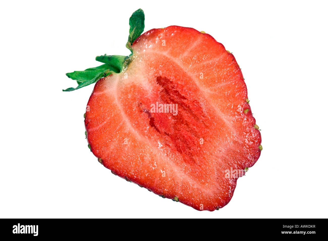 Sliced strawberry on white background Stock Photo - Alamy
