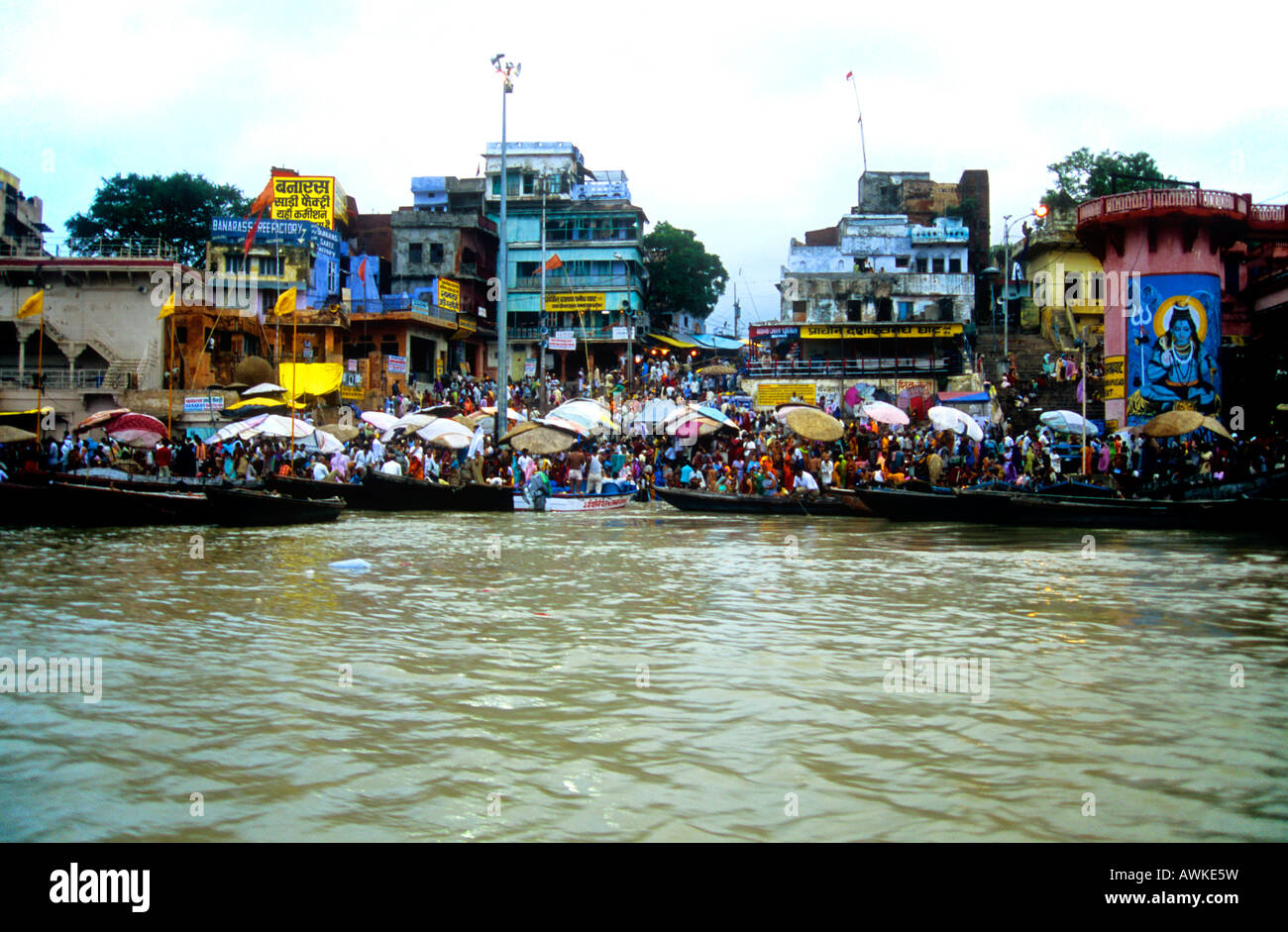 Morning gathering of locals at Prayag Ghat on the bank of the river ...