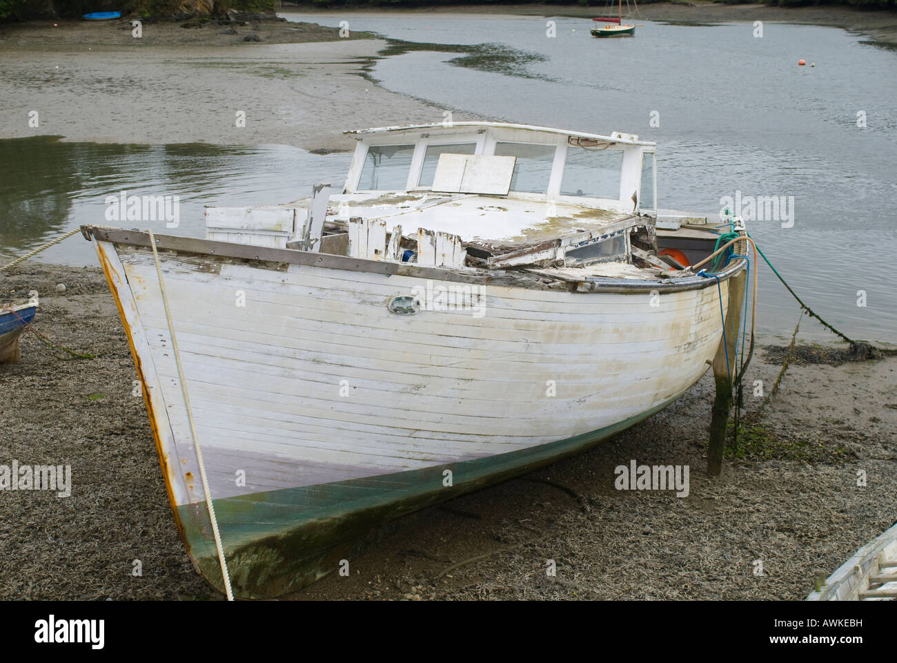 Decaying Wooden Boat Beached at Low Tide Stock Photo - Alamy