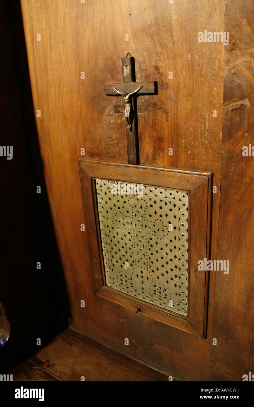 Man in church confession box hi-res stock photography and images - Alamy