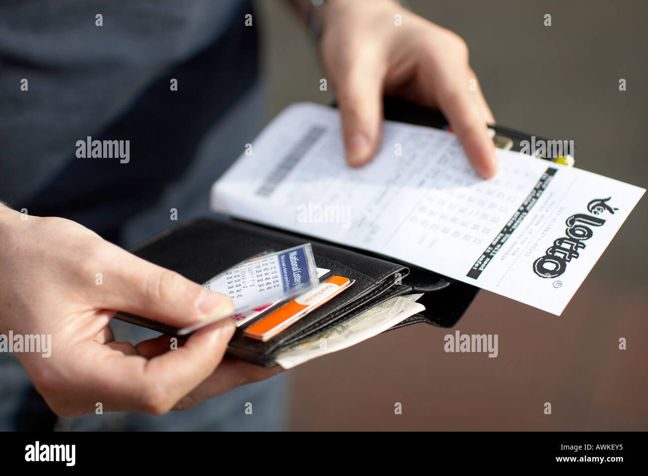 Uk lottery ticket hand hi-res stock photography and images - Alamy